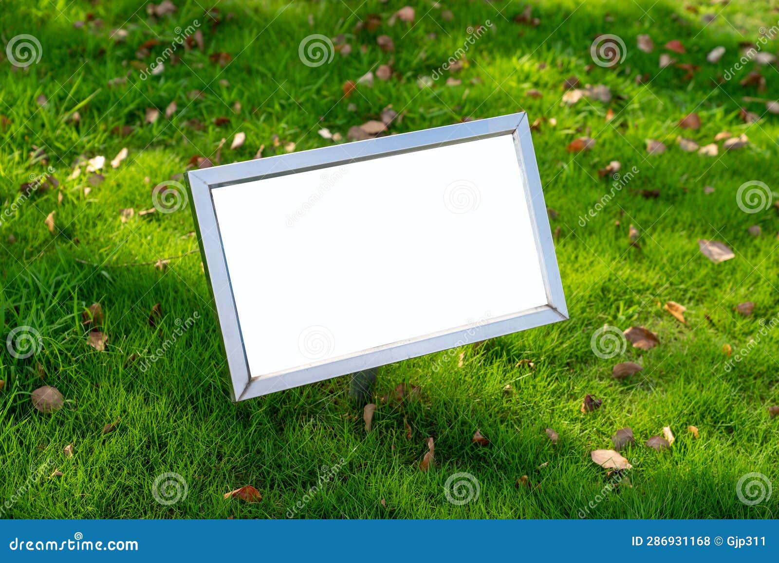 Ad Billboard Standing in a Field of Grass Stock Photo - Image of label ...