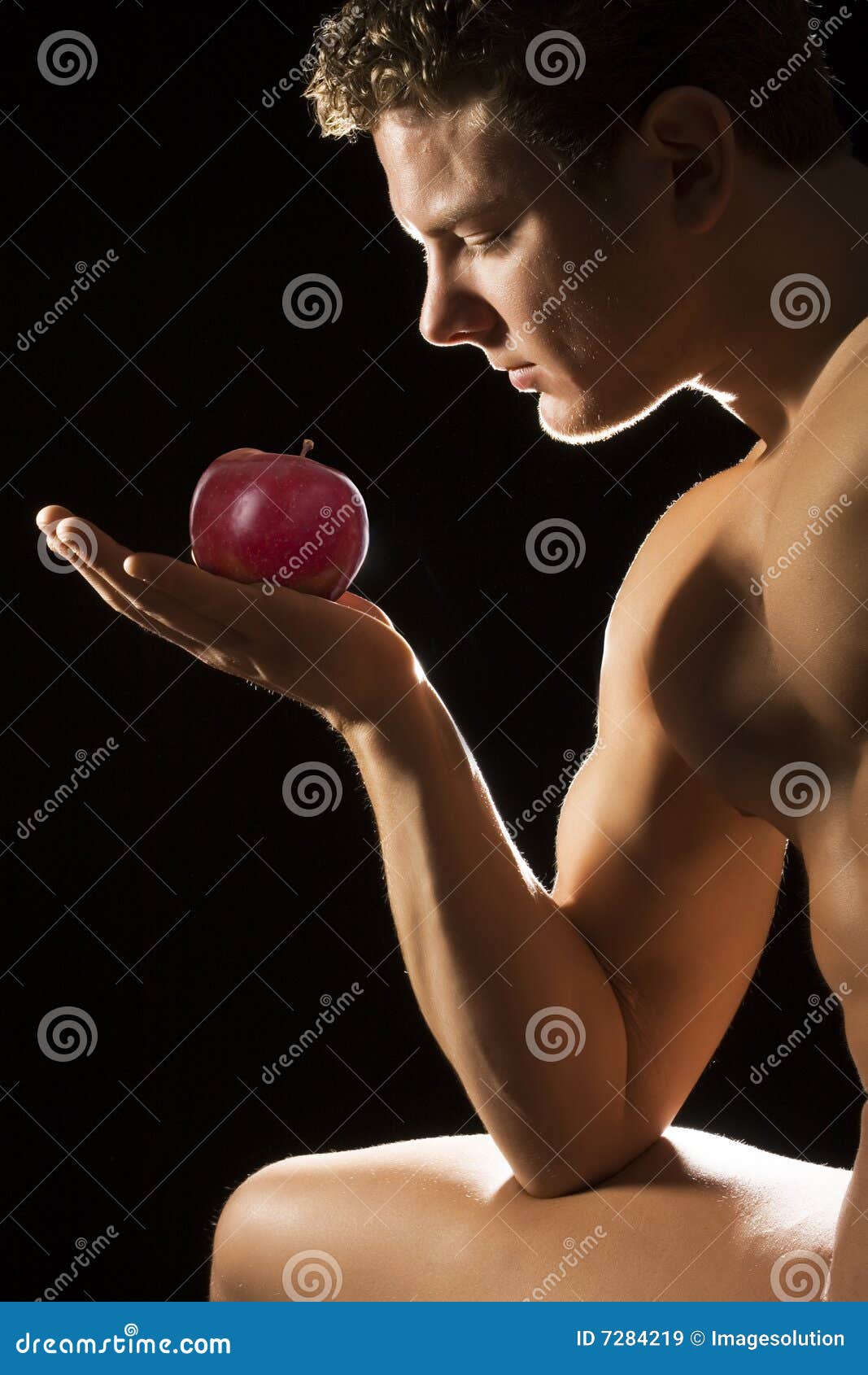 Adam looking at an apple stock image. Image of expression - 7284219