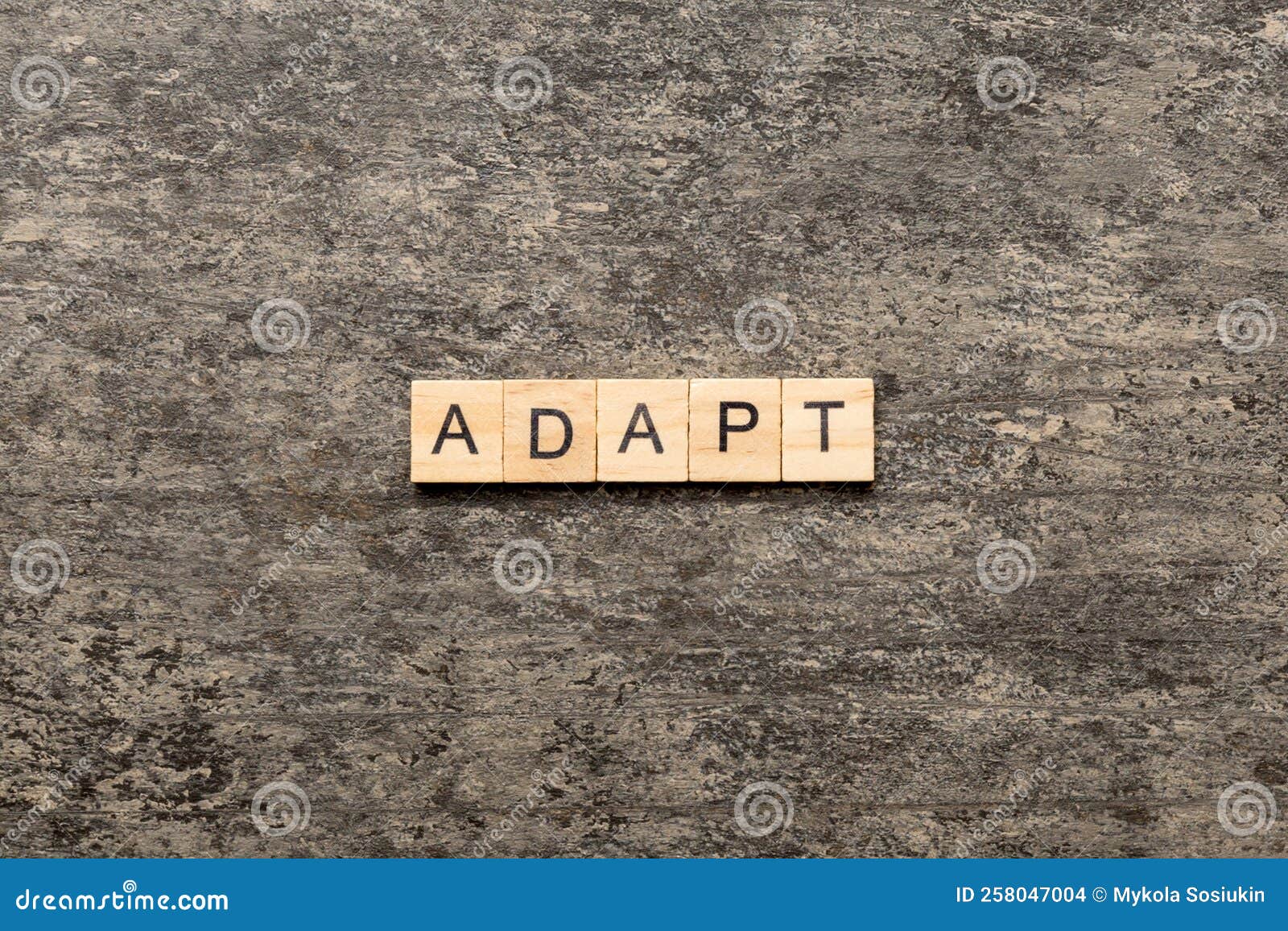 ADAPT Word Written on Wood Block. ADAPT Text on Cement Table for Your ...