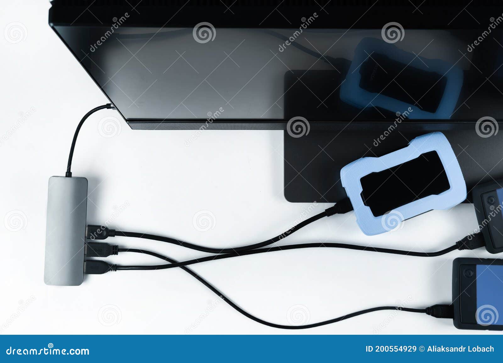 Adapter With External Hard Drives On A White Background.Many Different ...