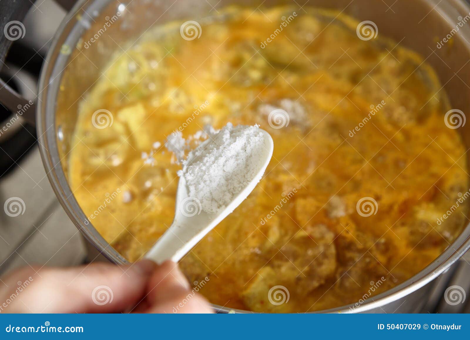 Add salt stock image. Image of steel, stove, spoon, blur - 50407029