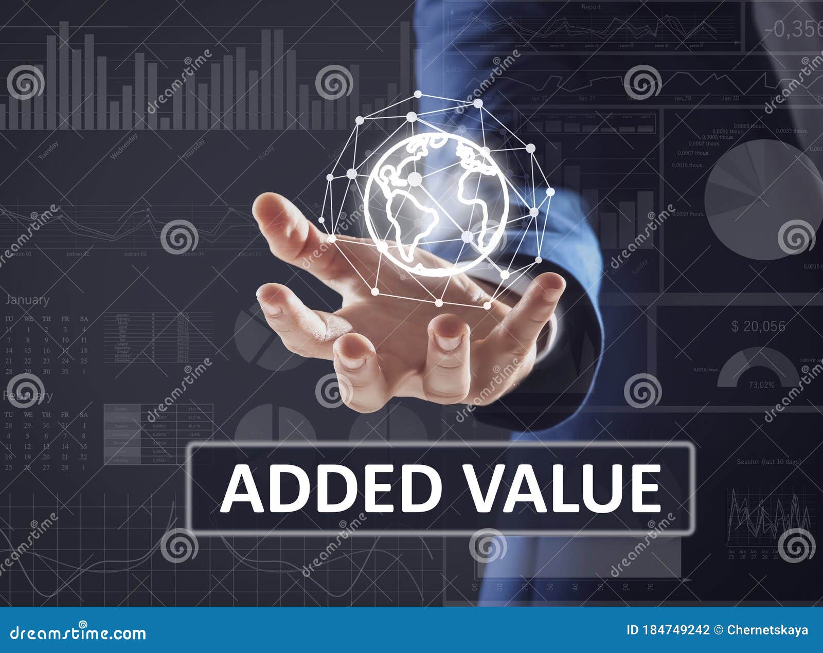 Added Value. Businessman Demonstrating World Globe and Charts on ...