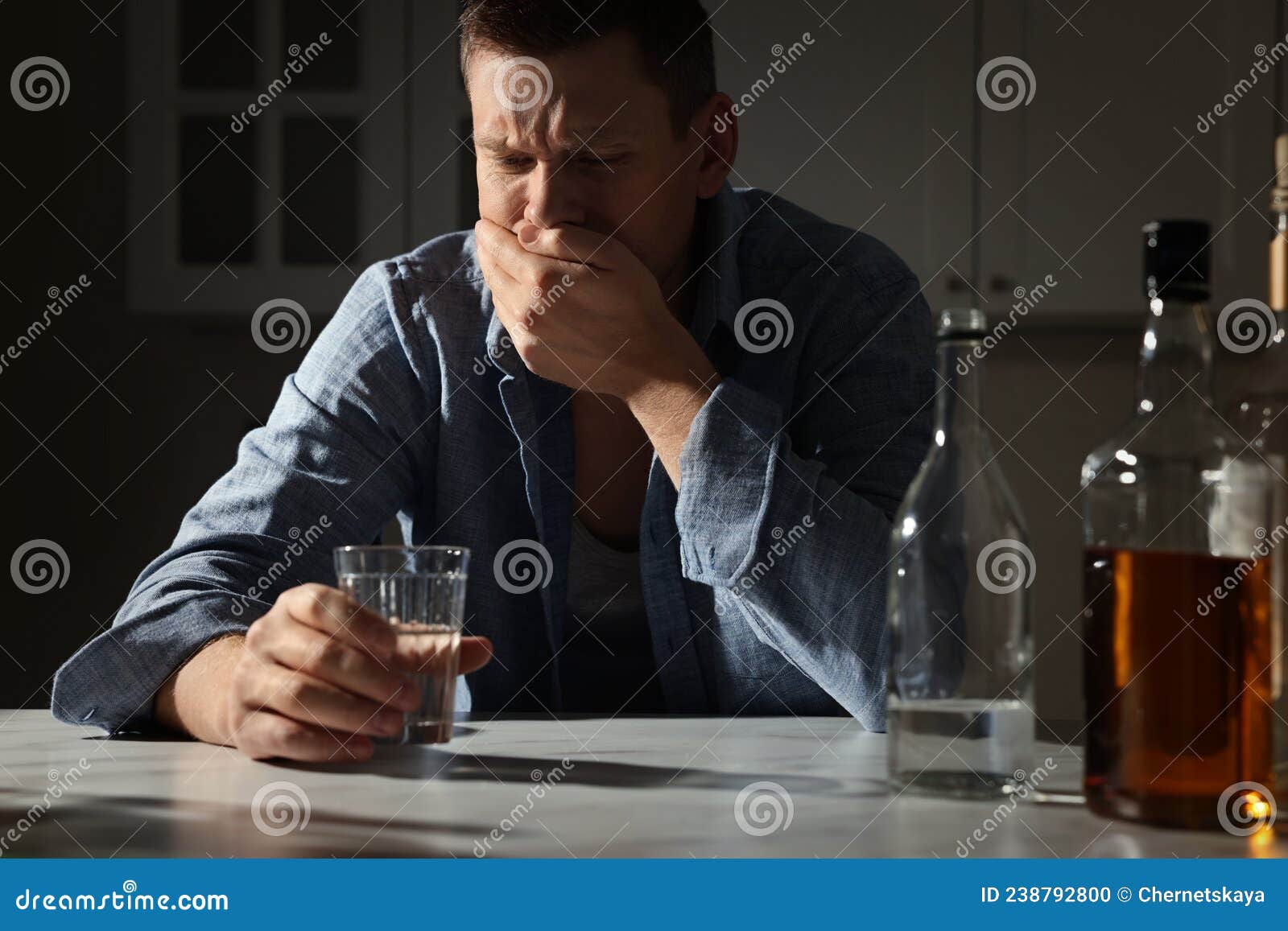 Addicted Drunk Man with Alcoholic Drink at Table in Kitchen Stock Photo ...
