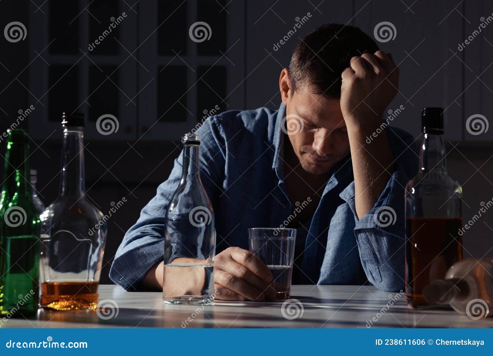 Addicted Man with Alcoholic Drink at Table in Kitchen Stock Photo ...