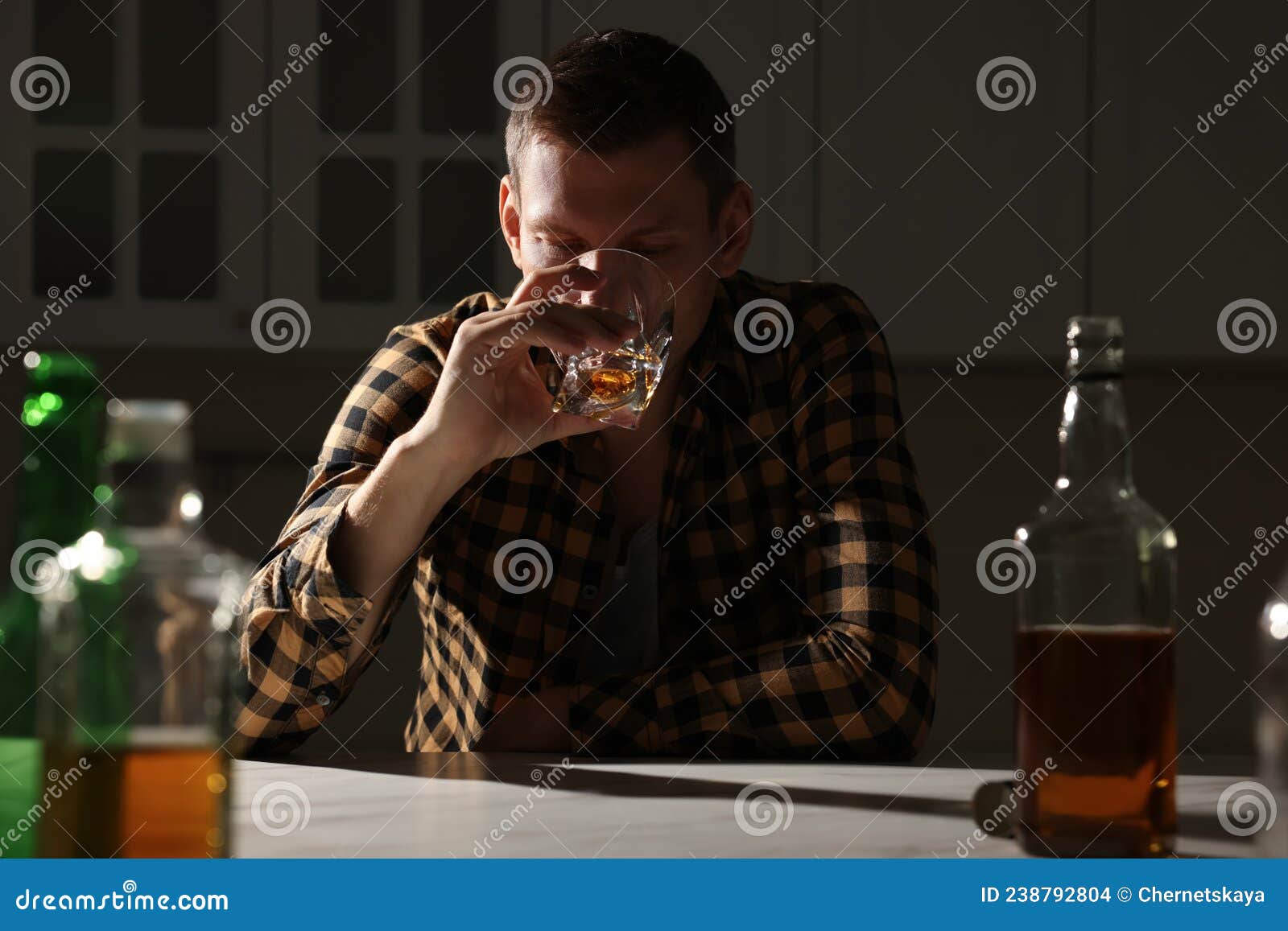 Addicted Man Drinking Alcohol at Table in Kitchen Stock Photo - Image ...