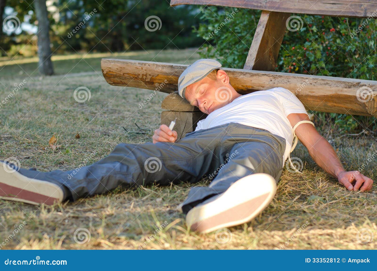 Addicted Man Fallen Down on the Ground Stock Photo - Image of bench ...
