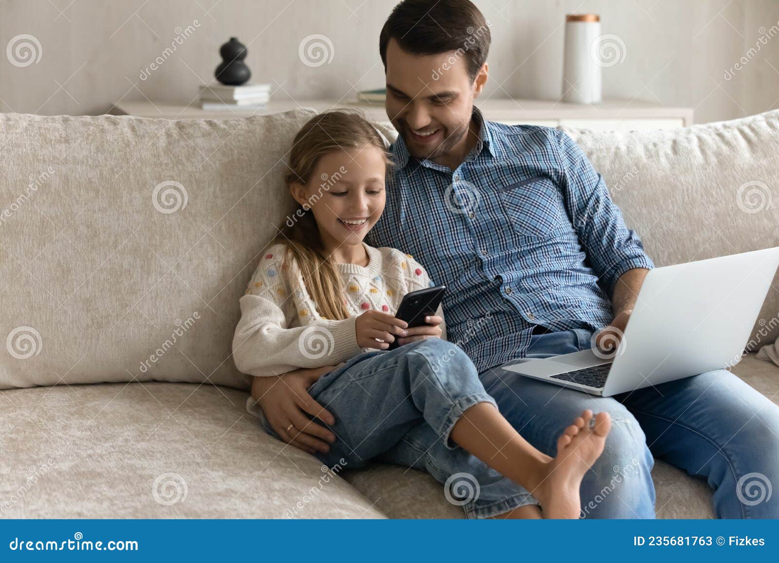 Addicted To Modern Tech Happy Family Using Different Gadgets. Stock ...