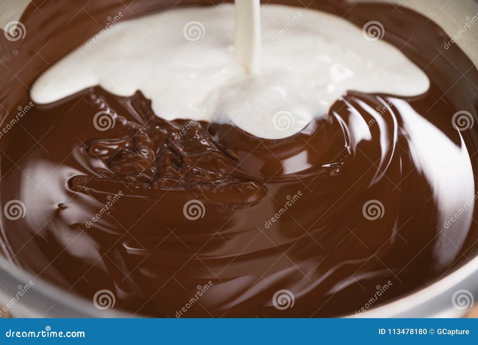 Adding Cream into Melted Chocolate Stock Photo - Image of melted ...