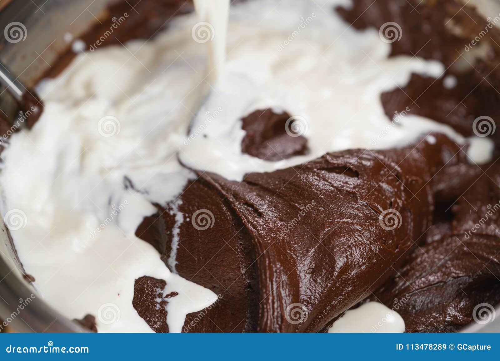 Adding Cream into Melted Chocolate Stock Image - Image of chocolater ...