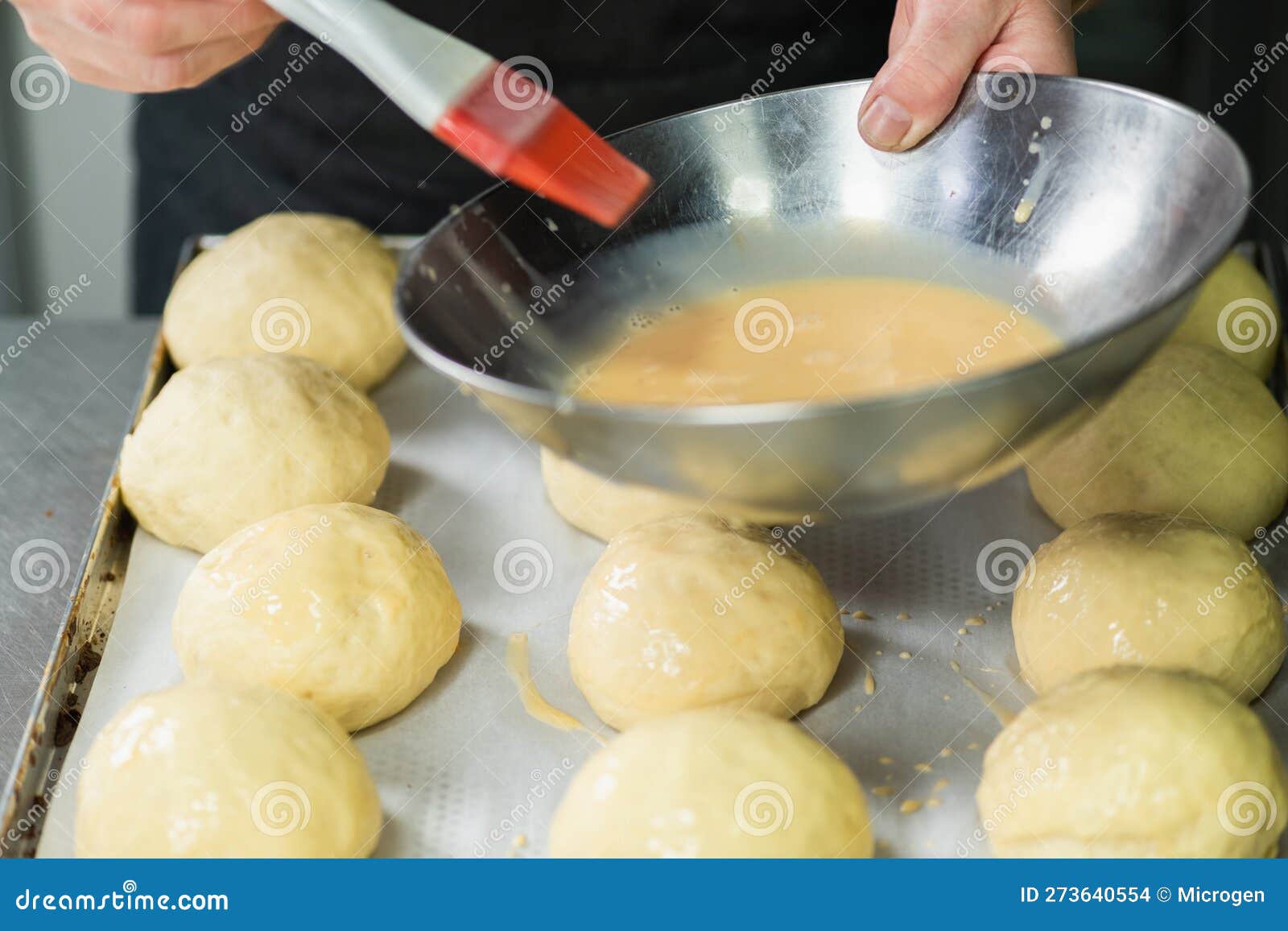 Adding Egg Yolk Over Raw Dough Balls Stock Photo - Image of commercial, preparation: 273640554