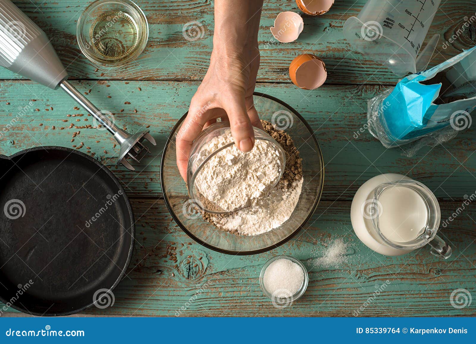 Adding Flour in Glass Bowl for Pancakes Preparation Top View Stock ...