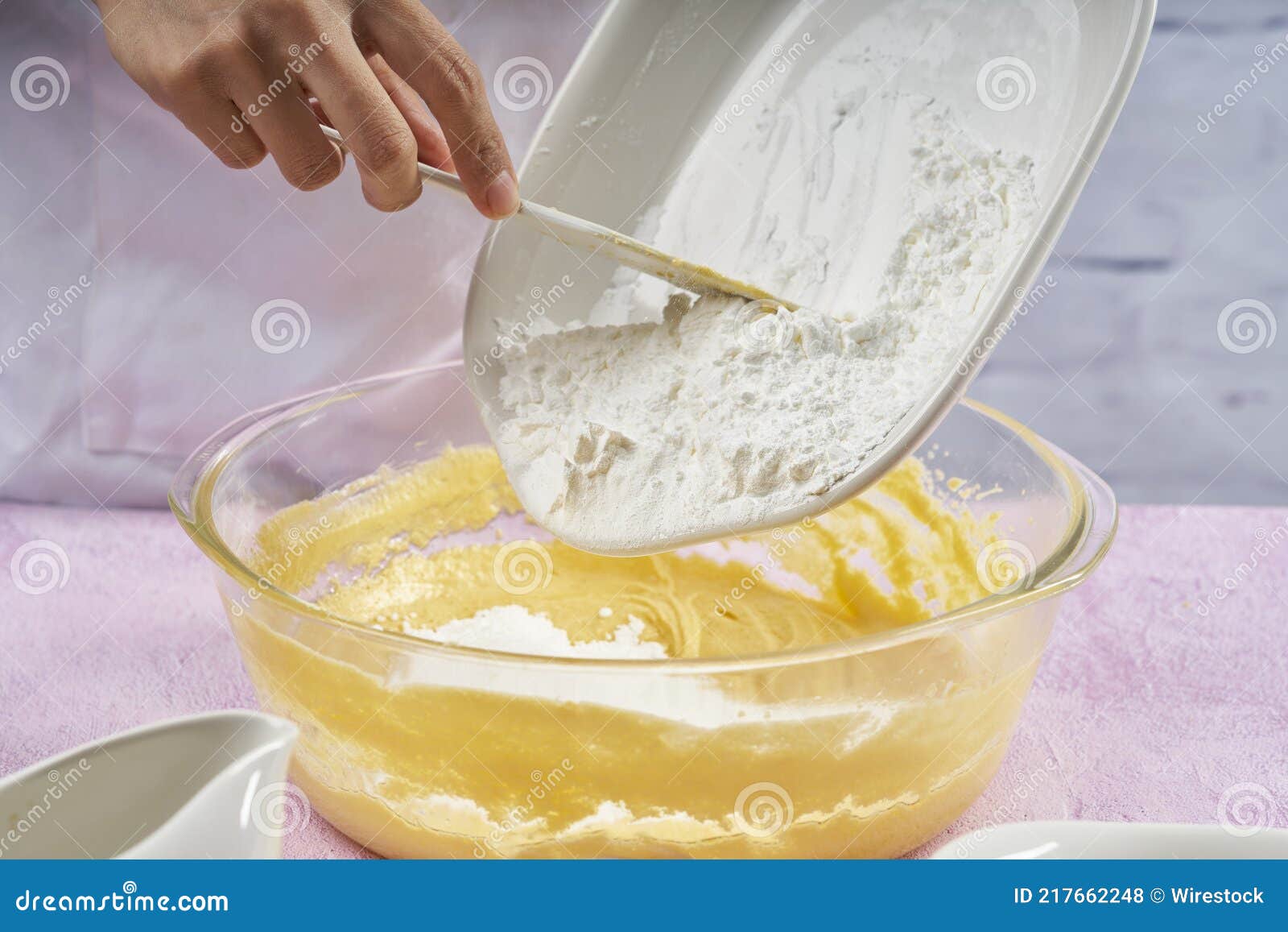 Adding Flour To a Mixing Bowl - Concept of Baking Stock Photo - Image ...