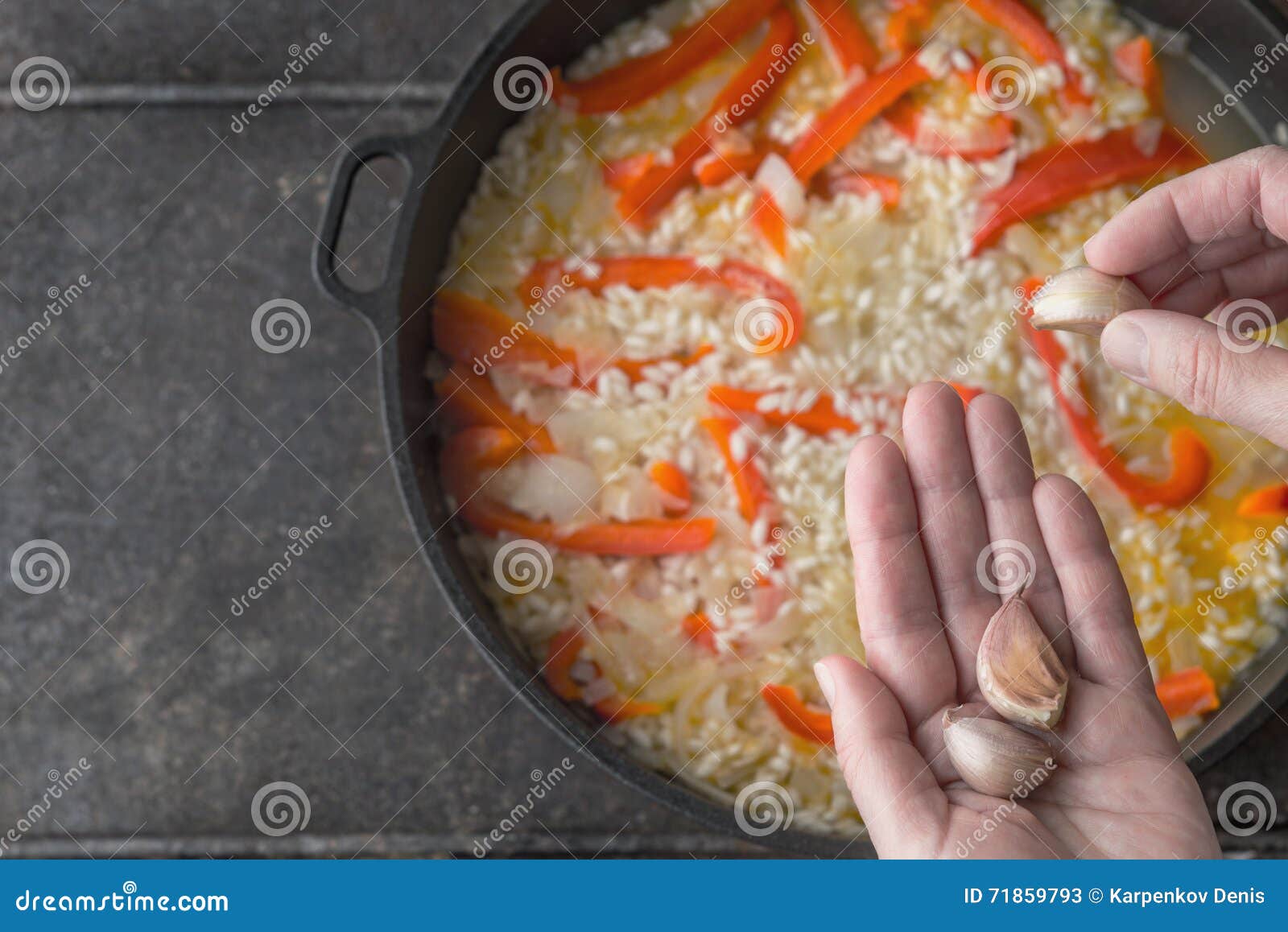 Adding Garlic in the Pan with Rice and Bell Pepper Top View Stock Image ...