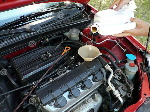 Adding Motor Oil to Car stock photo. Image of inspection - 19169376