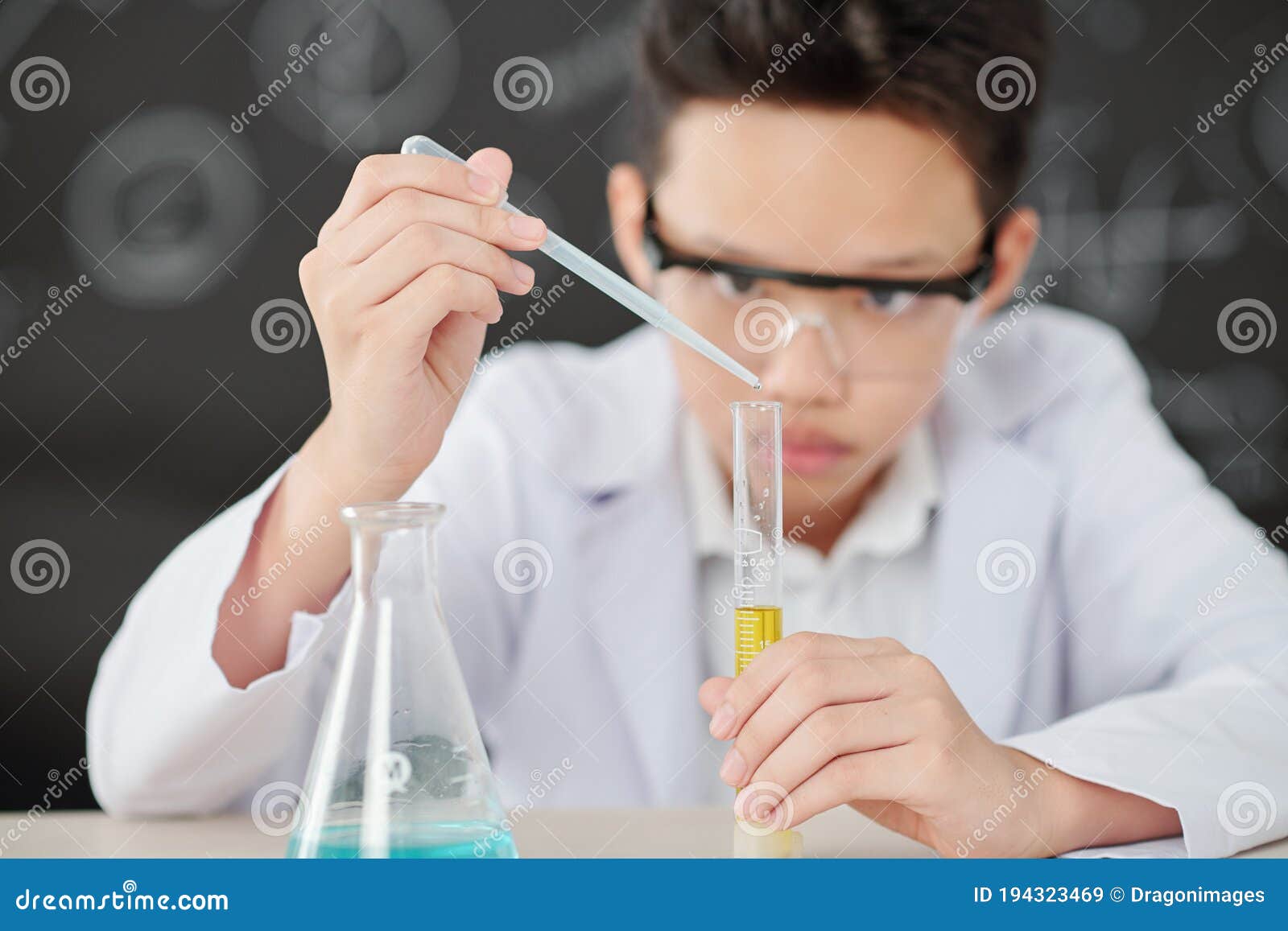 Adding Reagent in Test-tube Stock Image - Image of mixing, class: 194323469