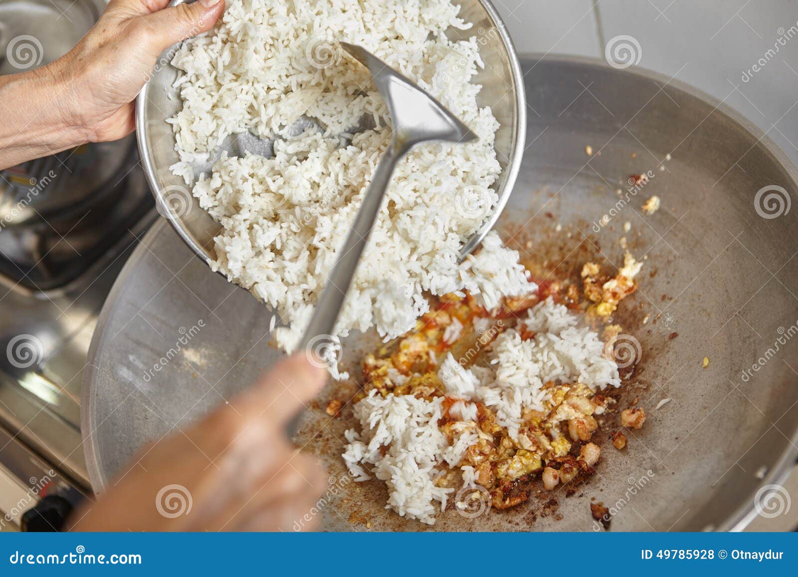 Adding rice stock photo. Image of adding, cooking, spatula - 49785928