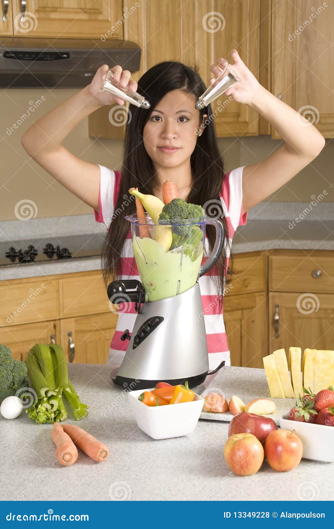 Adding salt pepper stock photo. Image of emotion, kitchen - 13349228