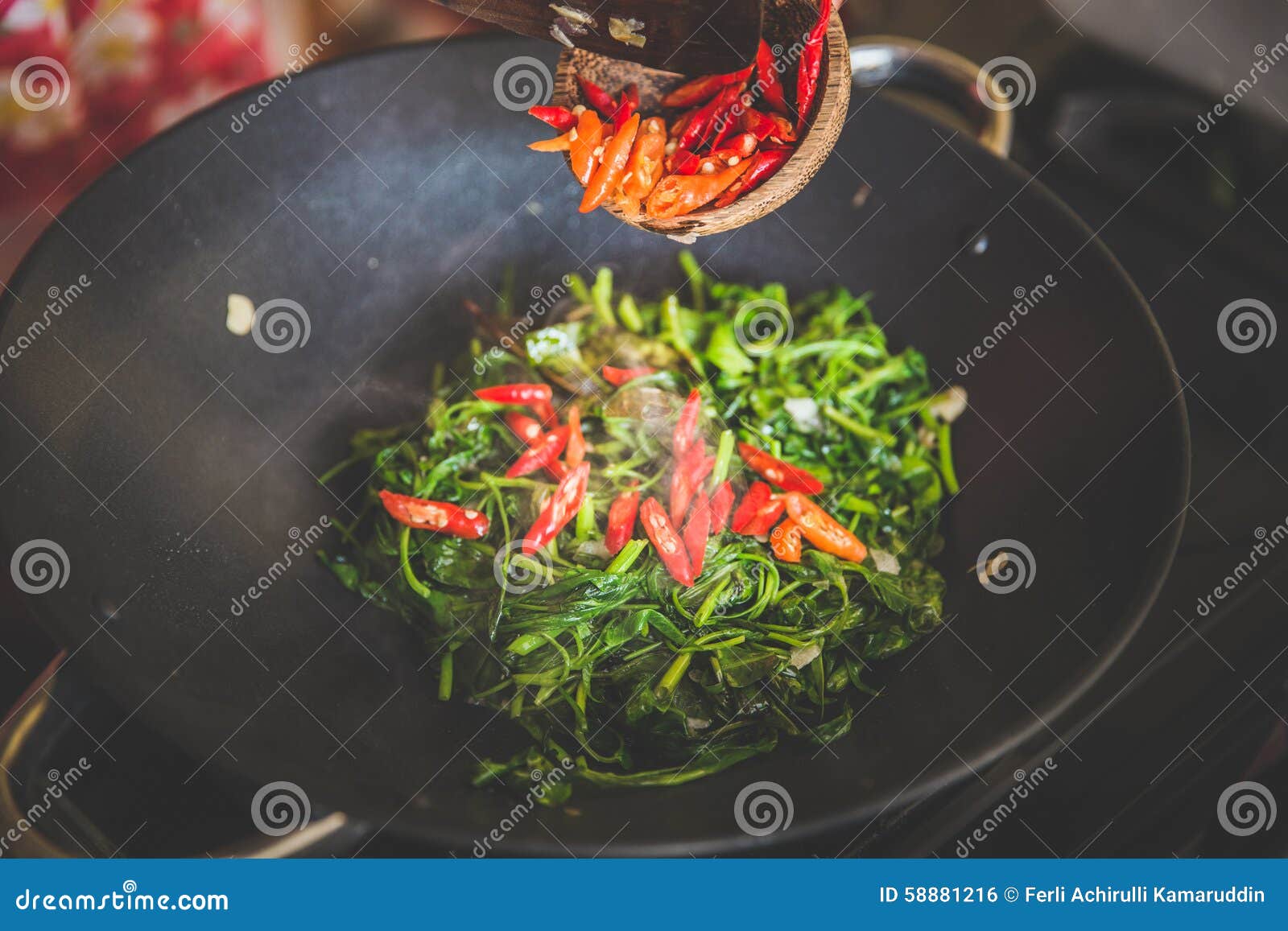 Adding Sliced Red Pepper into Water Spinach Stir-fry, Close Up Stock ...