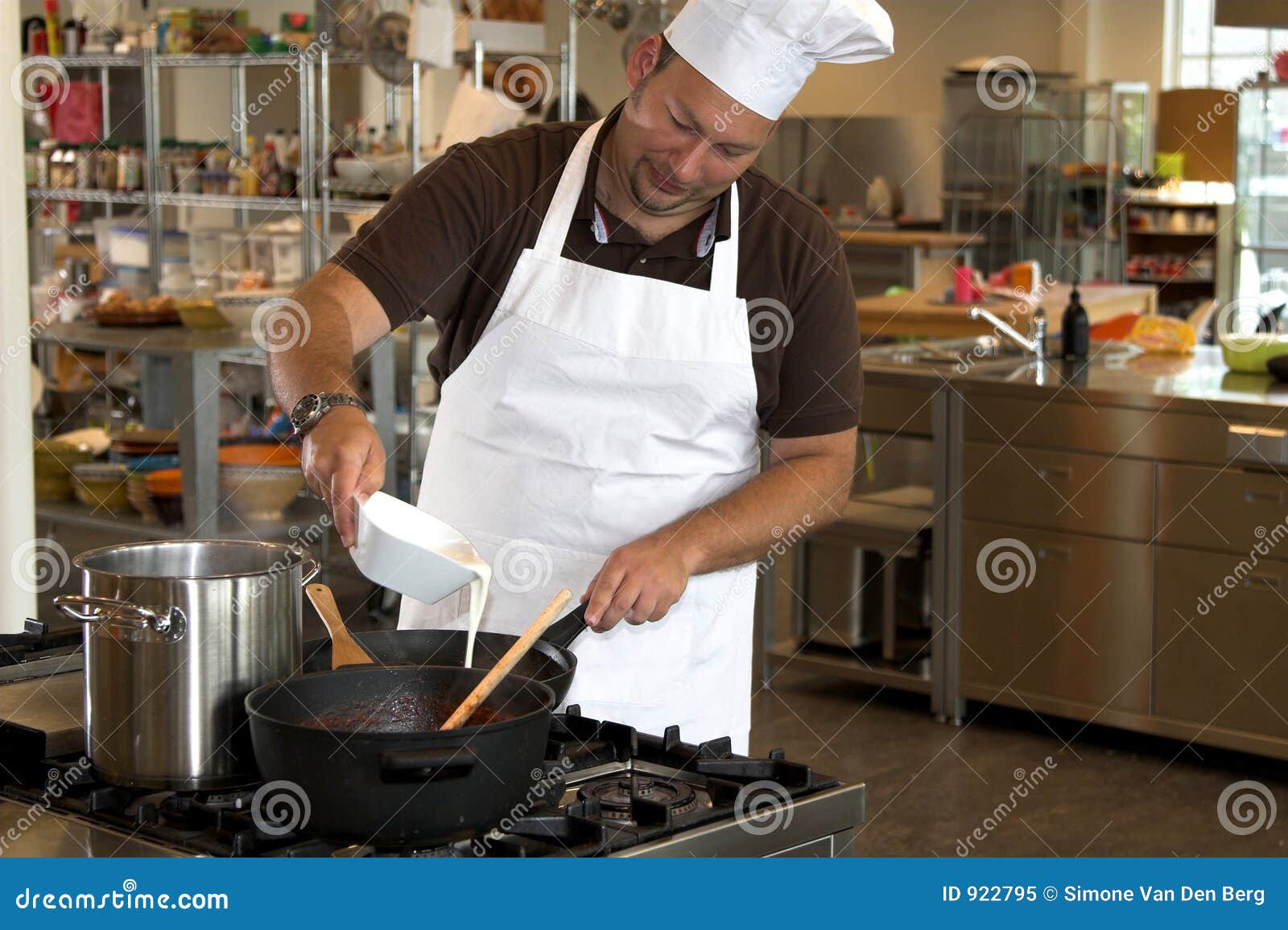 Adding some cream stock image. Image of profession, smiling - 922795