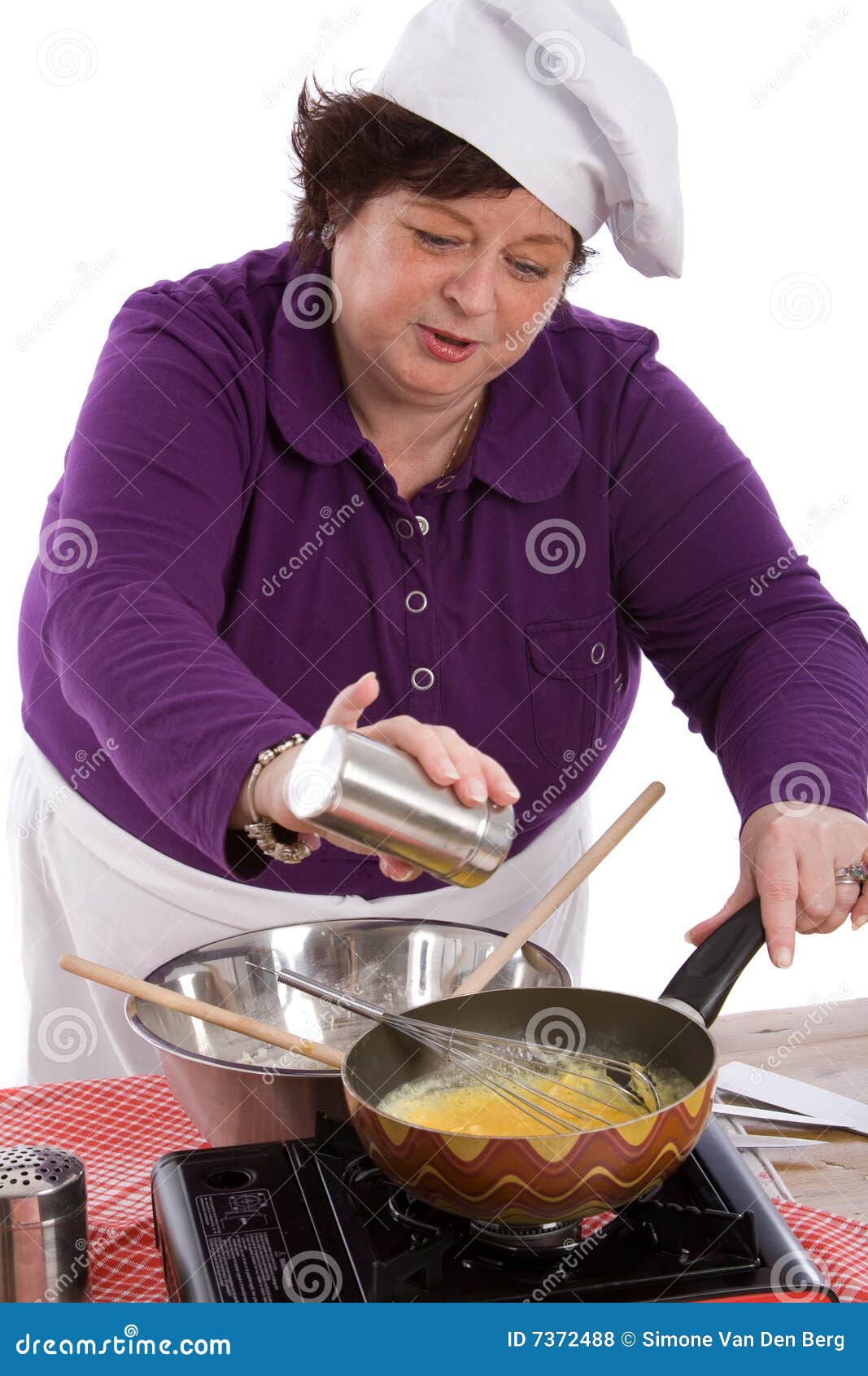 Adding some salt stock photo. Image of salt, female, middleaged - 7372488