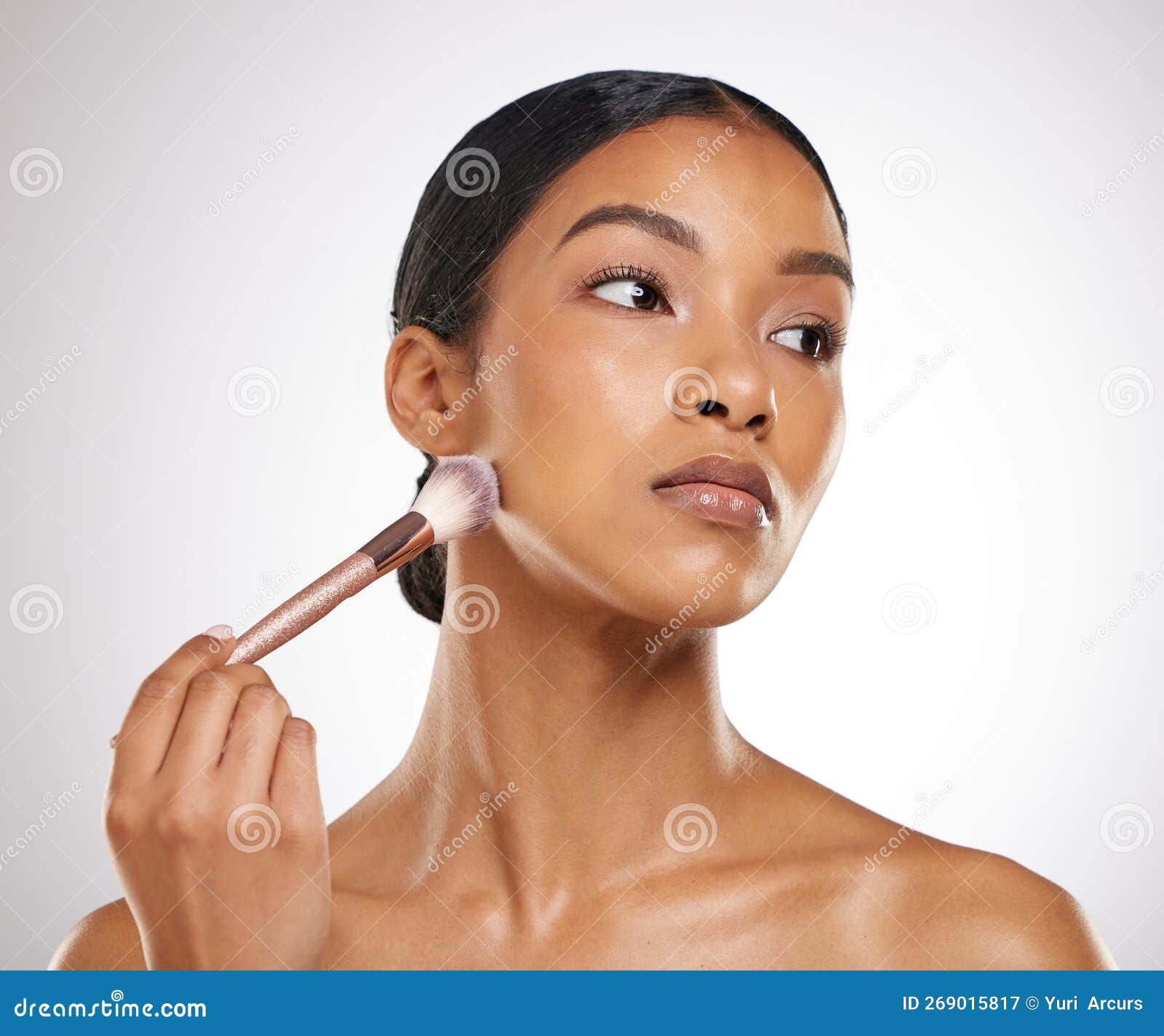 Adding a Splash of Colour. Studio Shot of an Attractive Young Woman ...