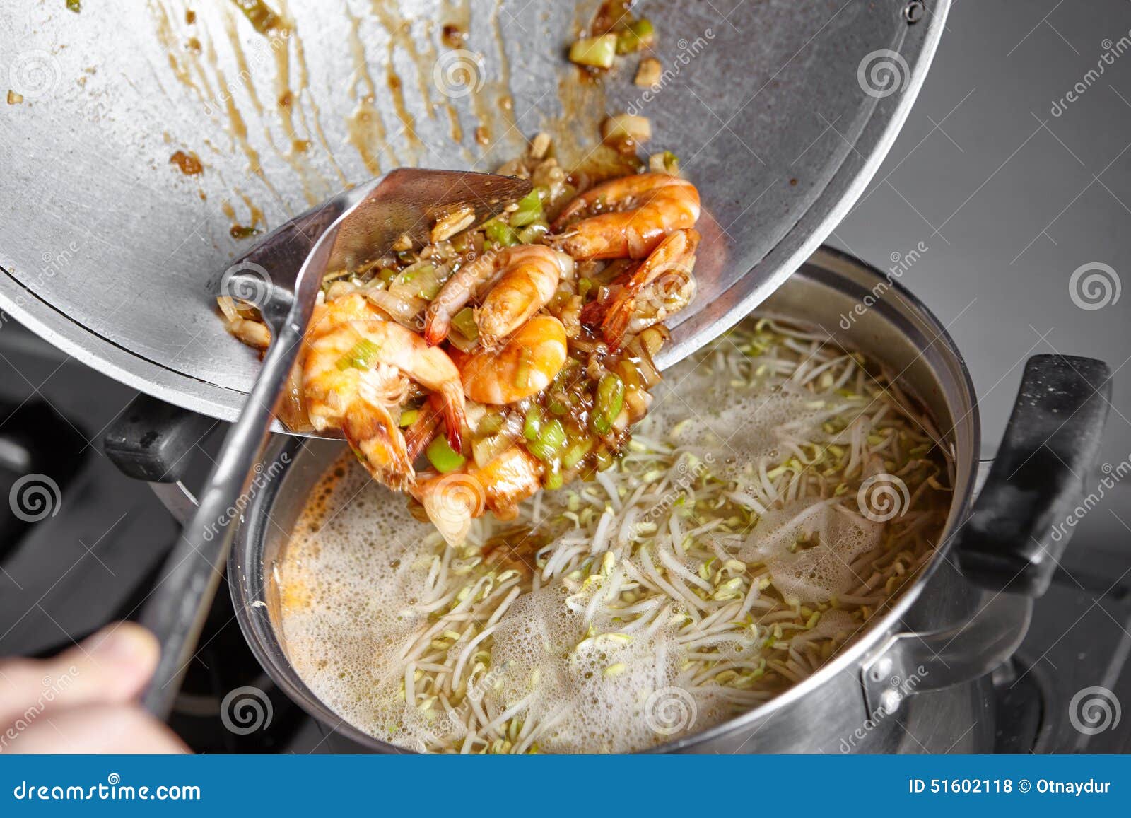 Adding the Stir Fried To the Soup Stock Photo - Image of shrimp, soup ...