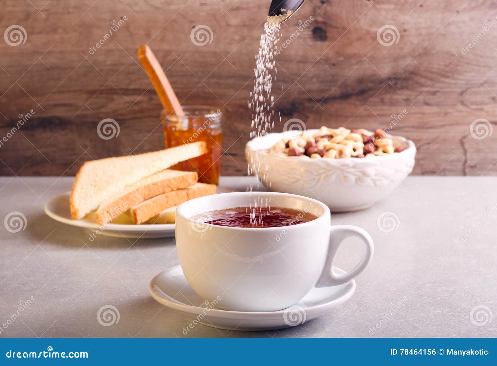 Adding Sugar into Tea in a Cup Stock Photo - Image of hand, black: 78464156