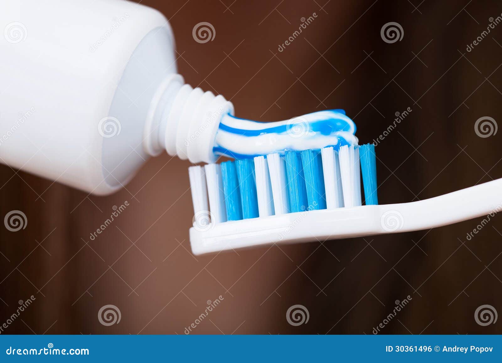 Adding Toothpaste on Brush stock photo. Image of fresh - 30361496