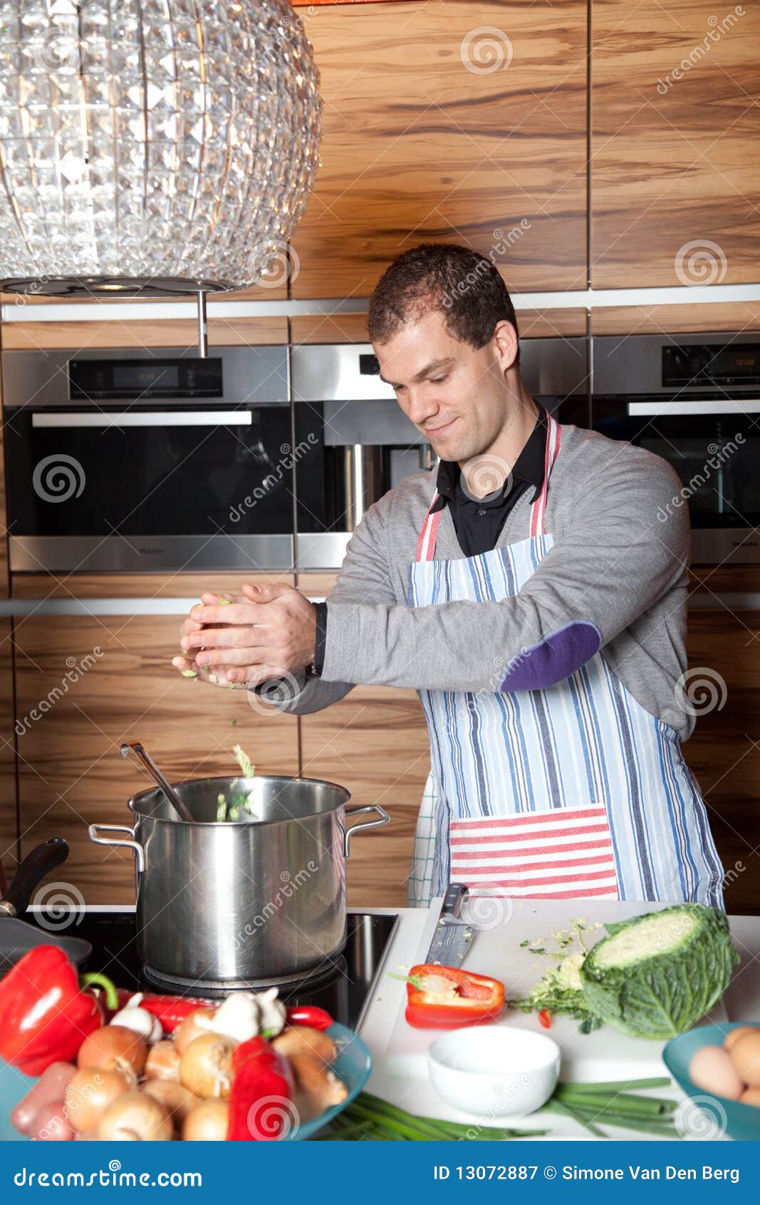 Adding the vegetables stock image. Image of cooking, kitchen - 13072887