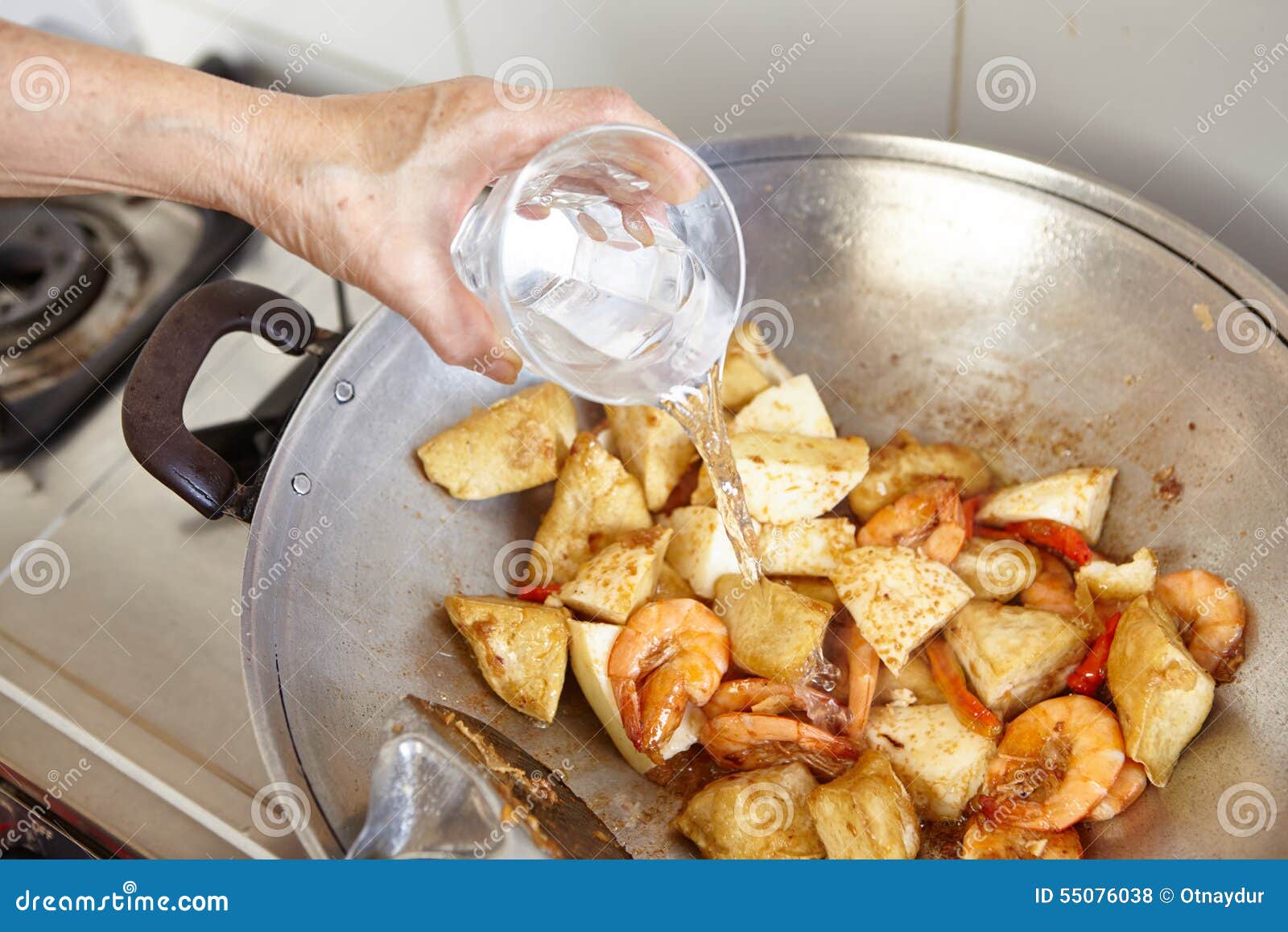 Adding water stock photo. Image of tofu, chef, stir, cook - 55076038