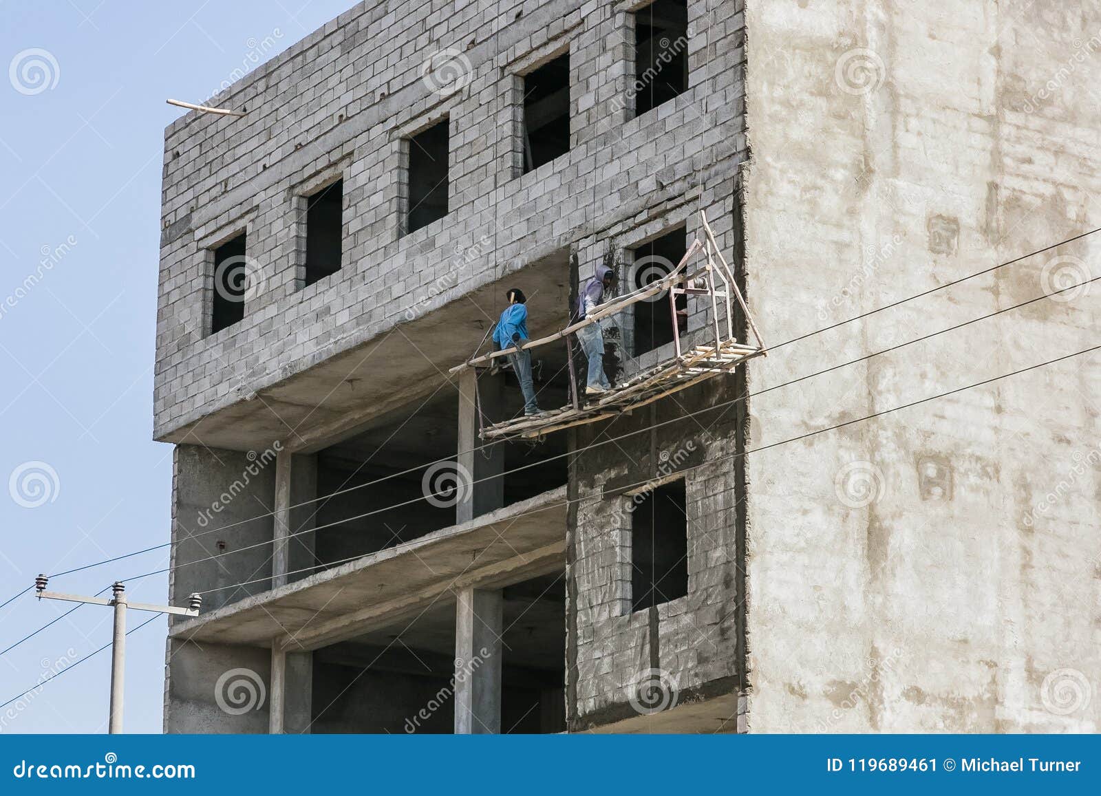 Construction Workers on a Hanging Scaffold Editorial Photo - Image of ...