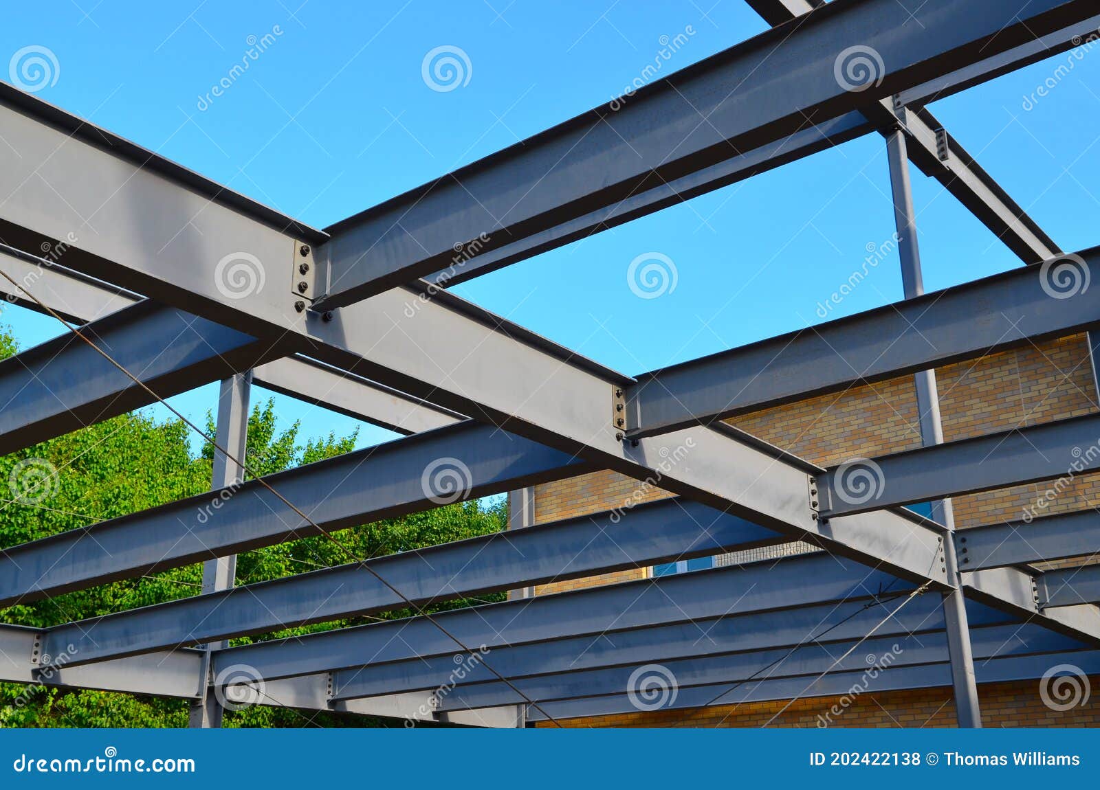 Steel Framework for an Addition To Existing Building. Stock Photo ...