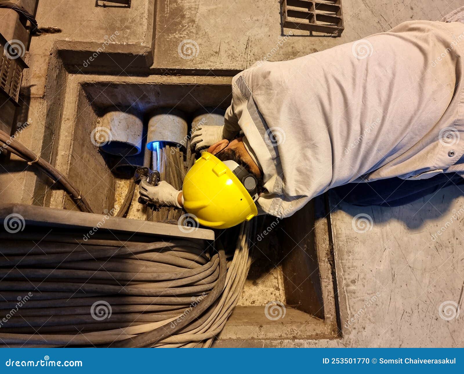 Pulling An Electrical Cable Out Of A Wall Socket To Save Energy Royalty ...