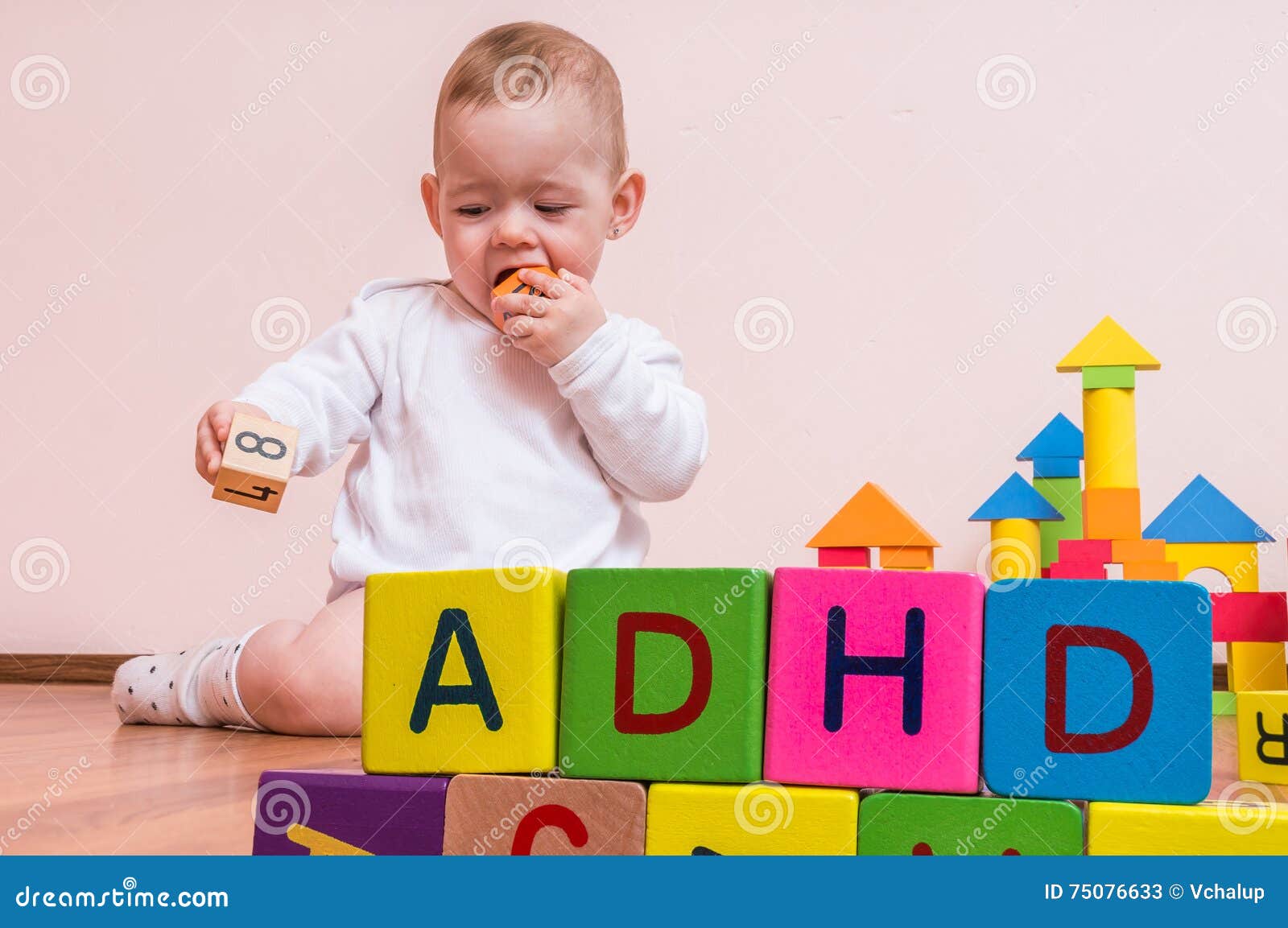 ADHD Concept. Baby is Playing with Colorful Cubes with Letters Stock ...