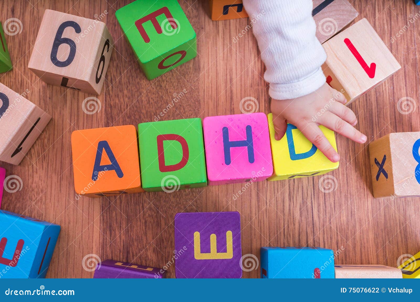ADHD Concept. Baby is Playing with Cubes with Letters Stock Photo ...