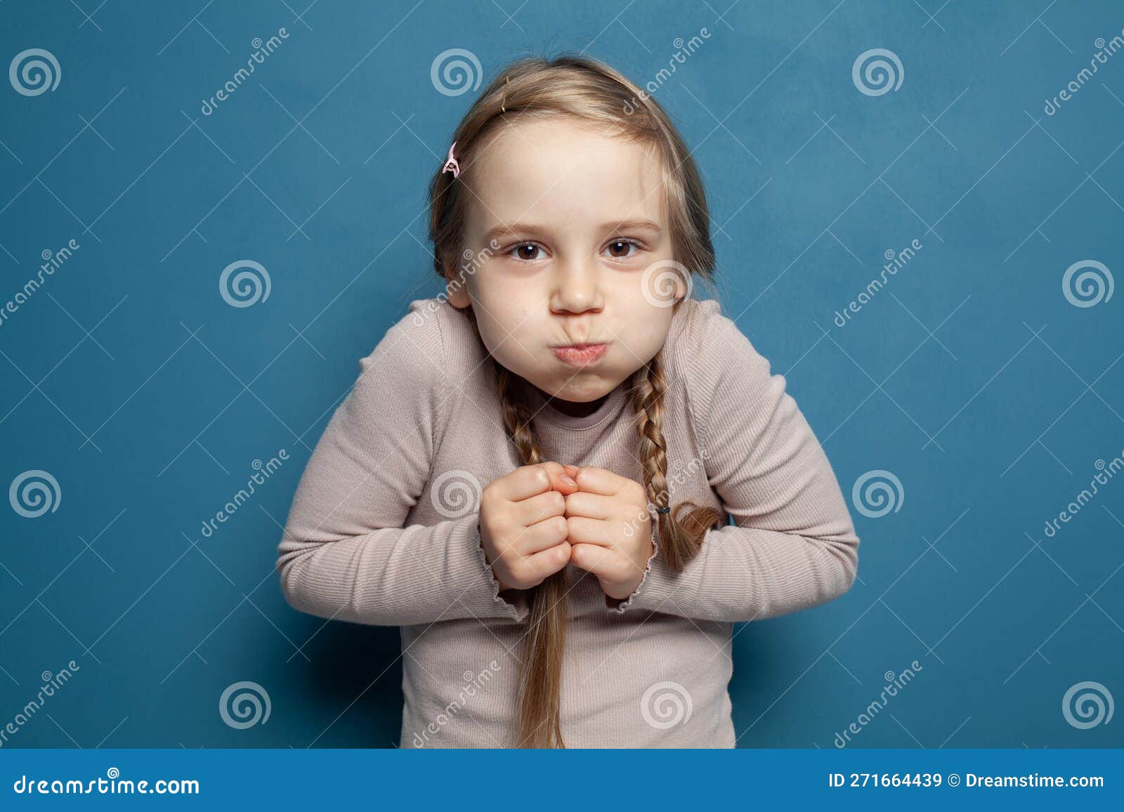 ADHD Hyperactive Child on the Background of Blue Wall Stock Image ...