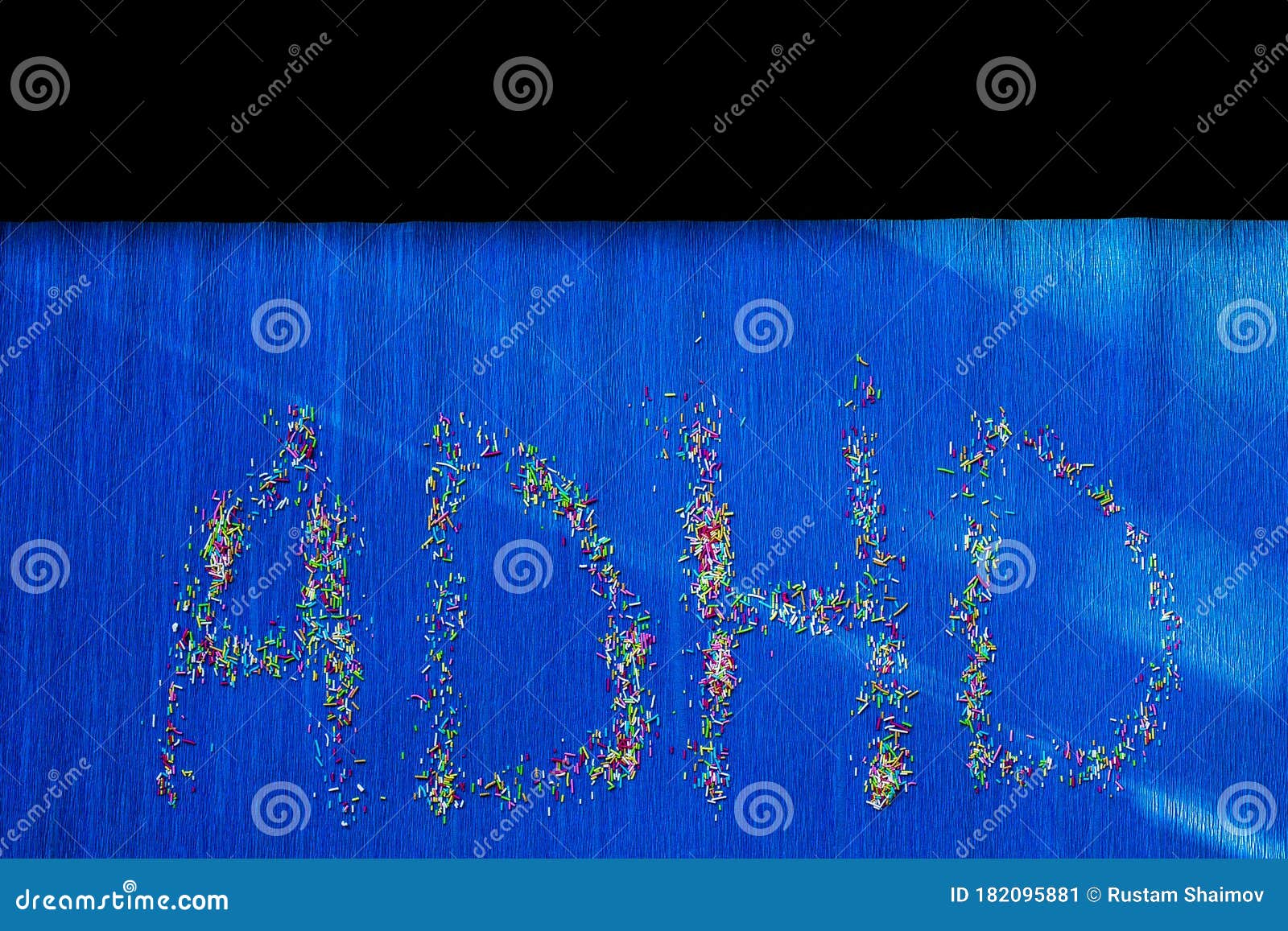 ADHD Written with Pastry Sprinkles on a Blue Background. ADHD is ...