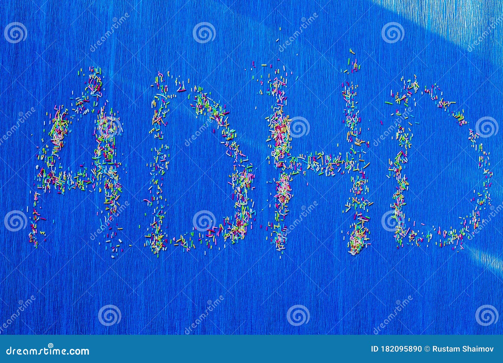 ADHD Written with Pastry Sprinkles on a Blue Background. ADHD is ...