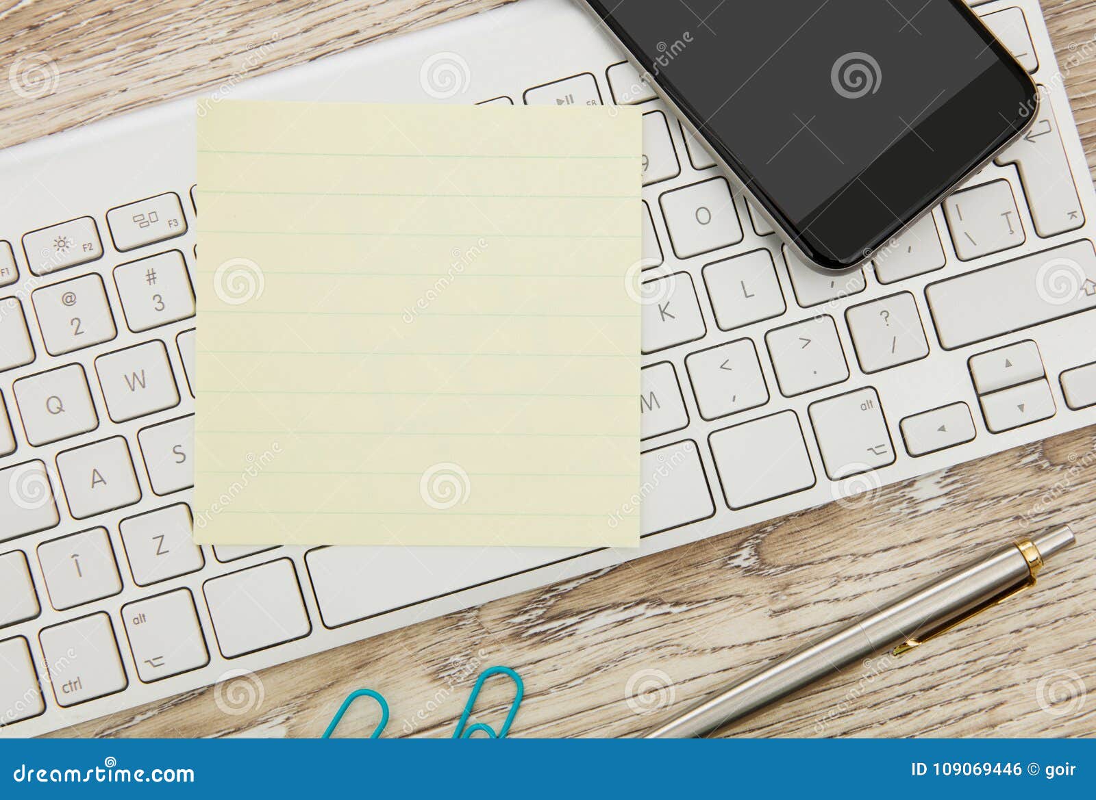 Adhesive note on desk stock photo. Image of phone, angle - 109069446