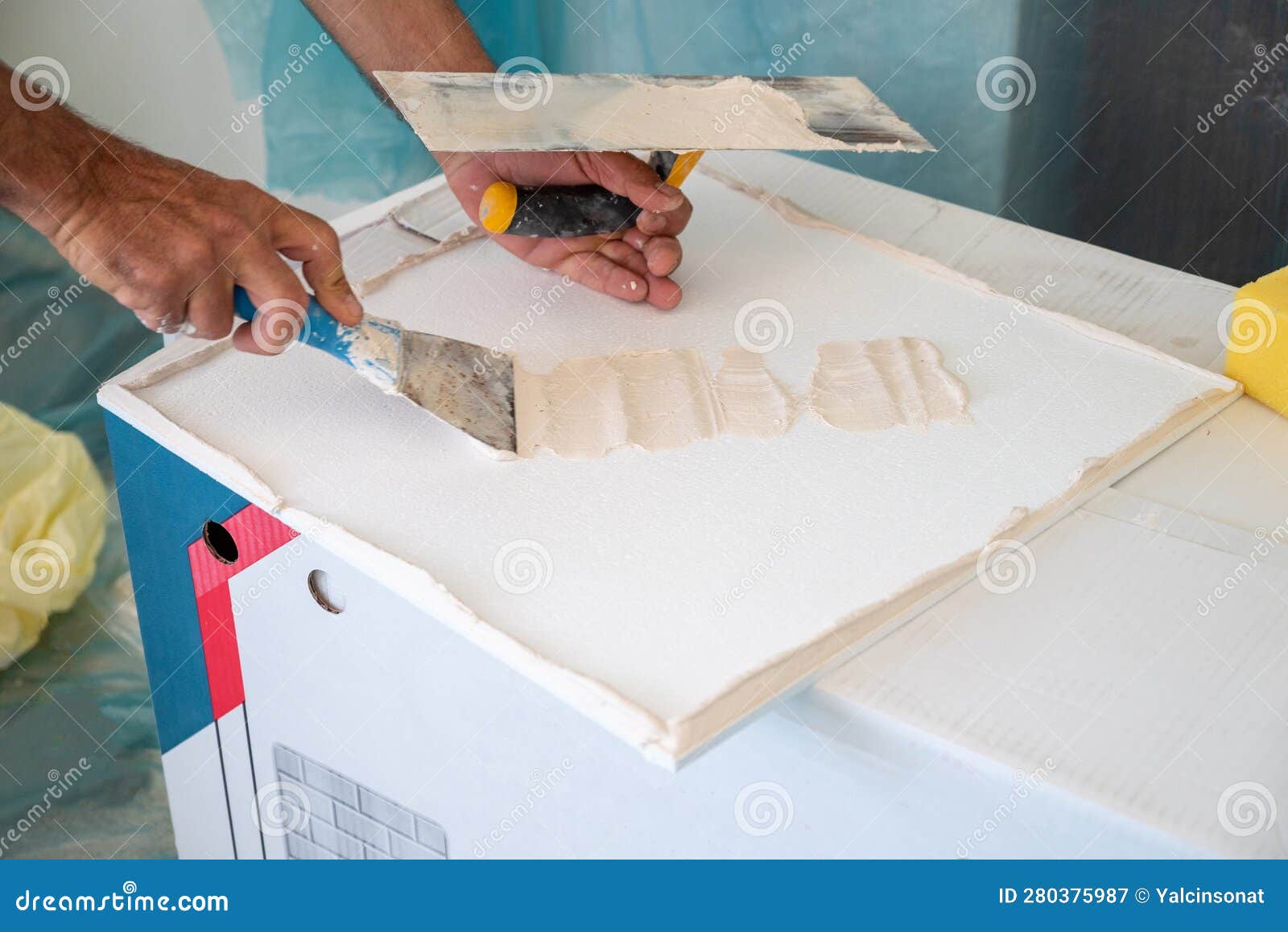 Adhesive Plaster Application of Styrofoam Ceiling Tiles of a Home ...