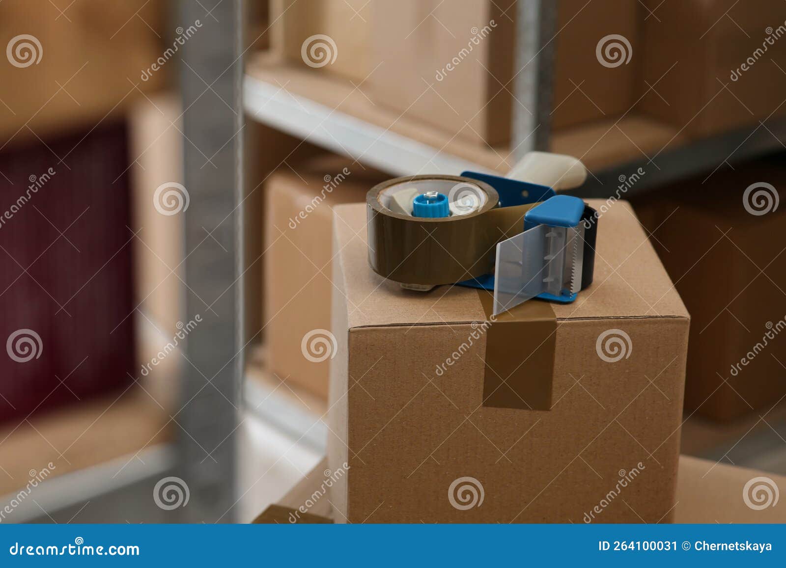 Adhesive Tape Dispenser on Cardboard Box Indoors. Space for Text Stock ...