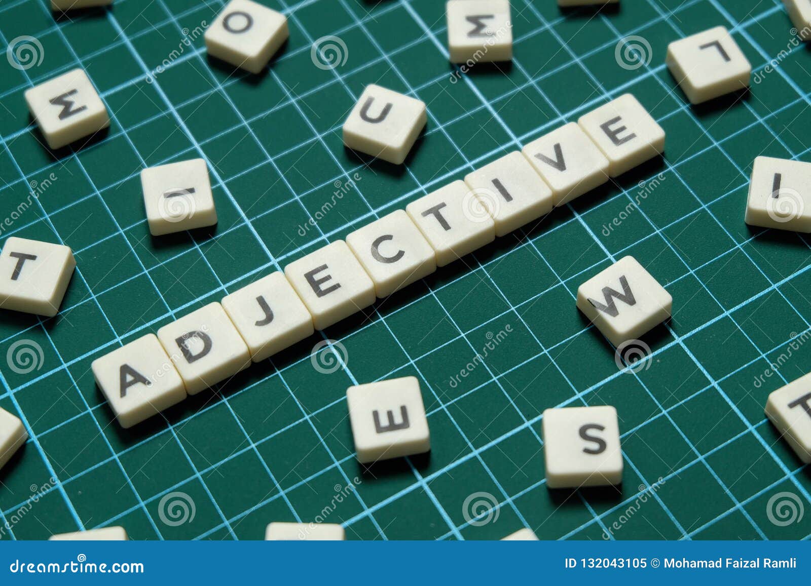 Adjective Word Made Of Square Letter Word On Green Square Mat ...