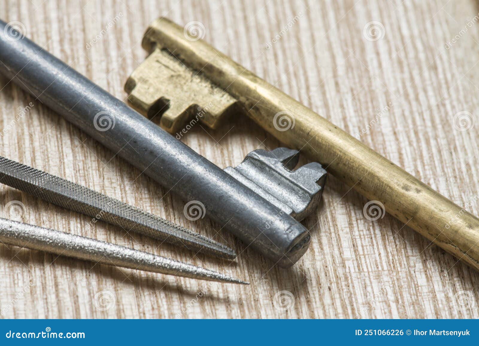 Adjust the Keys of the Padlock in the Workshop. Key Master Stock Photo ...