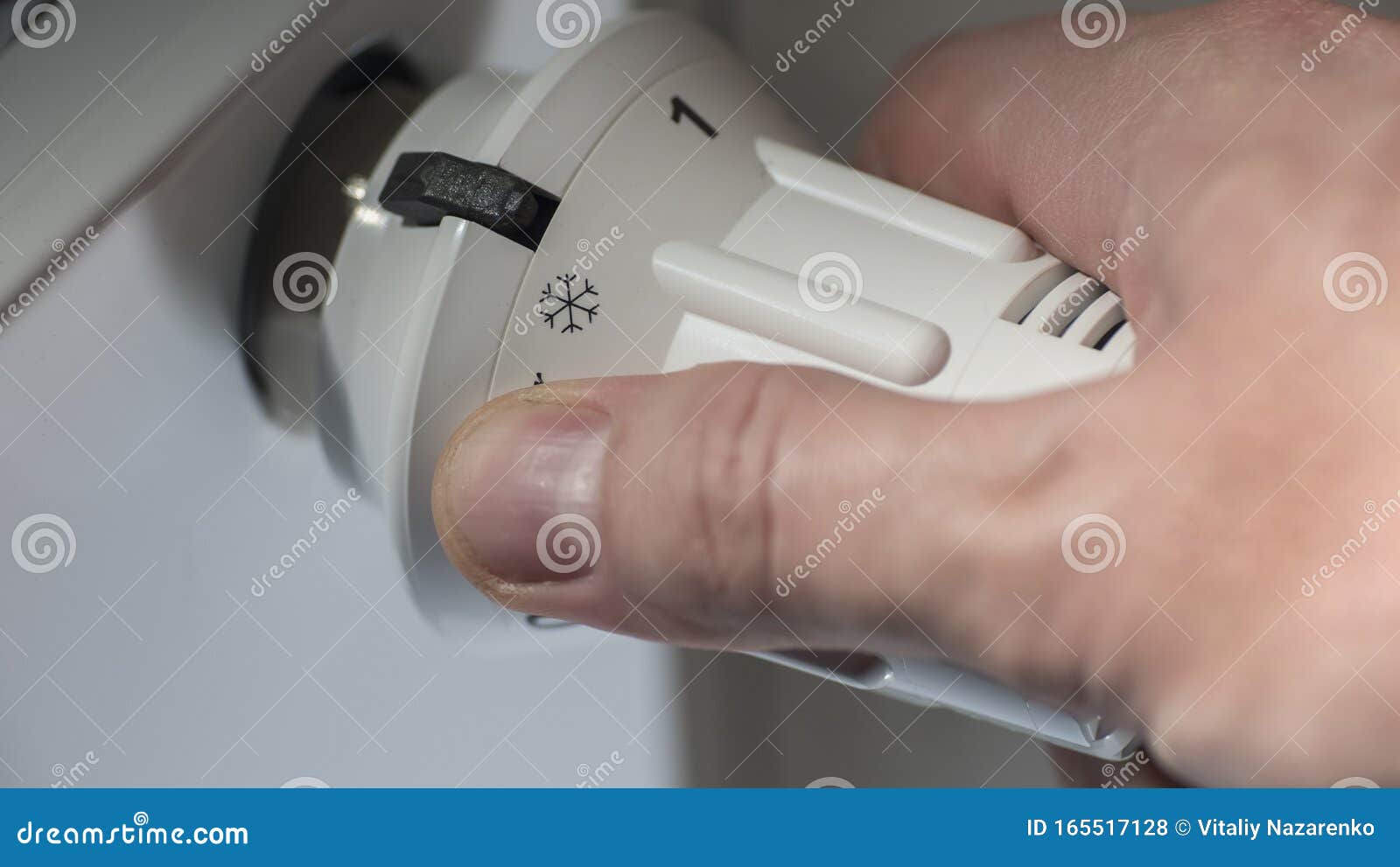 Adjust the Temperature on the Heating Radiator. Energy Saving Stock ...