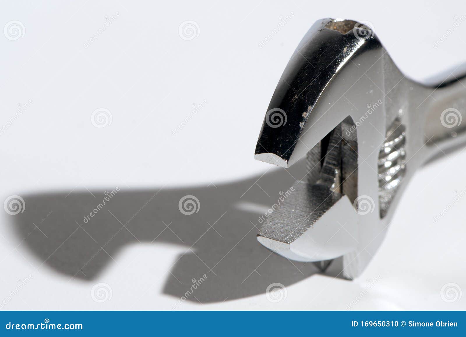 Adjustable Crescent Wrench with Shadow on White Background Stock Photo ...