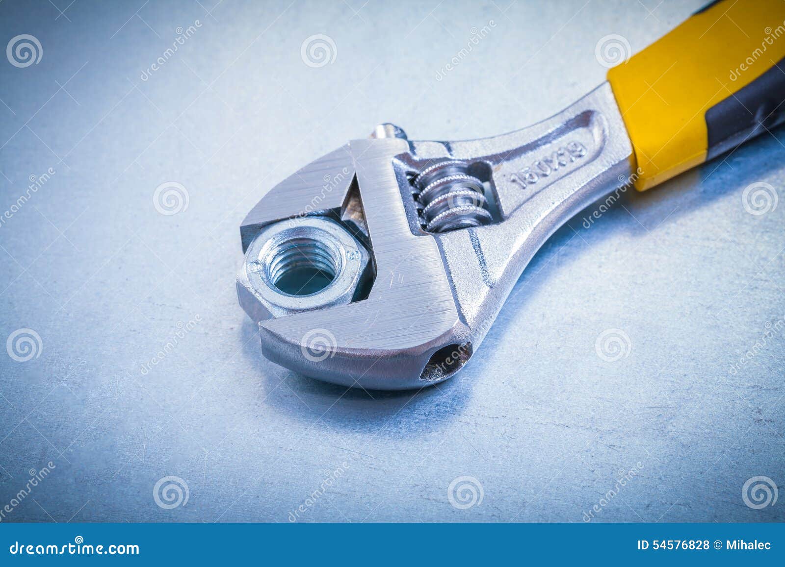 Adjustable Spanner and Nut on Metallic Stock Photo - Image of threading ...