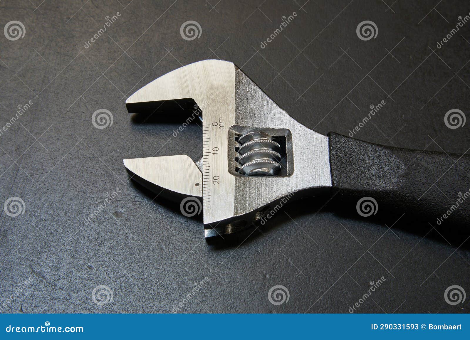 Adjustable Wrench on Black Wooden Table Stock Image - Image of wrench ...