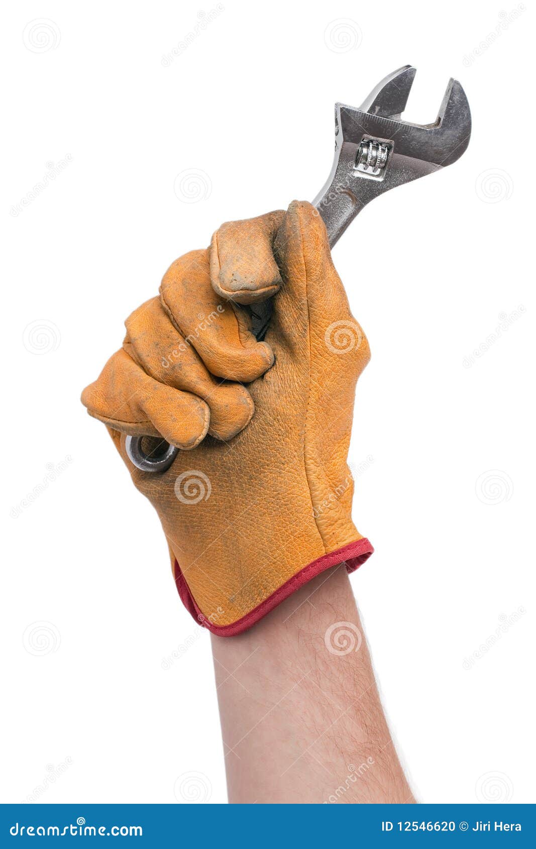 Adjustable wrench in hand stock photo. Image of metal - 12546620