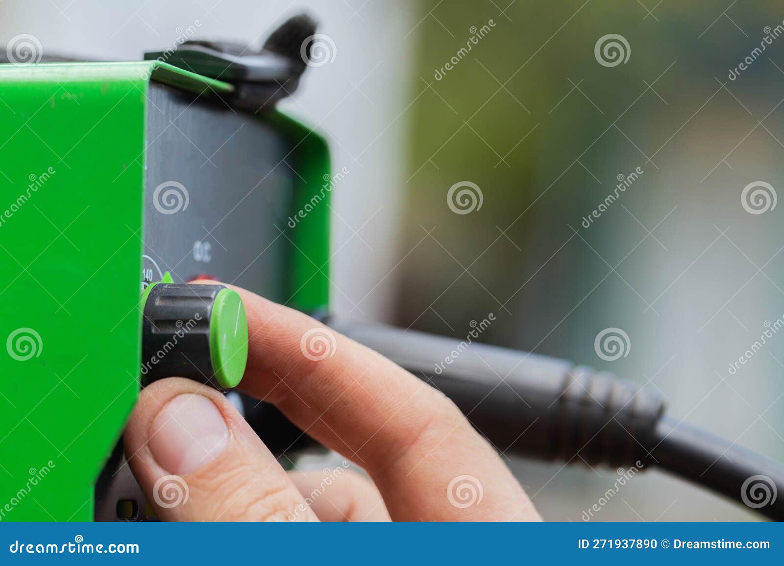 Adjusting the Current Strength on a Modern Welding Machine. Welding Arc ...