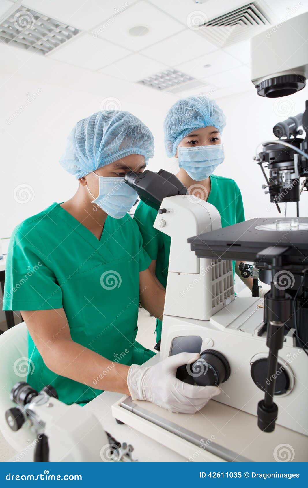 Adjusting microscope stock image. Image of microscope - 42611035